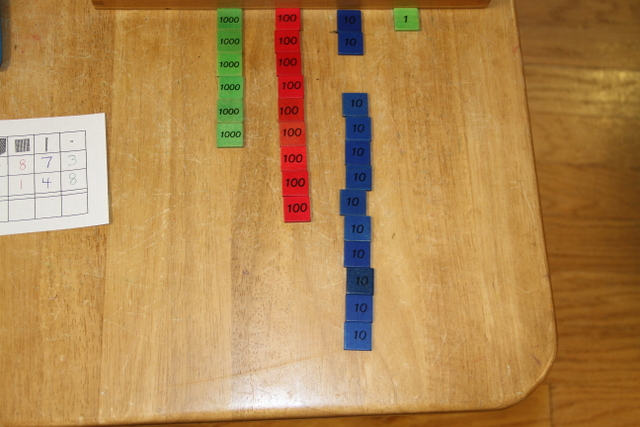 File:Stamp Game Dynamic Addition 11.JPG - Montessori Album