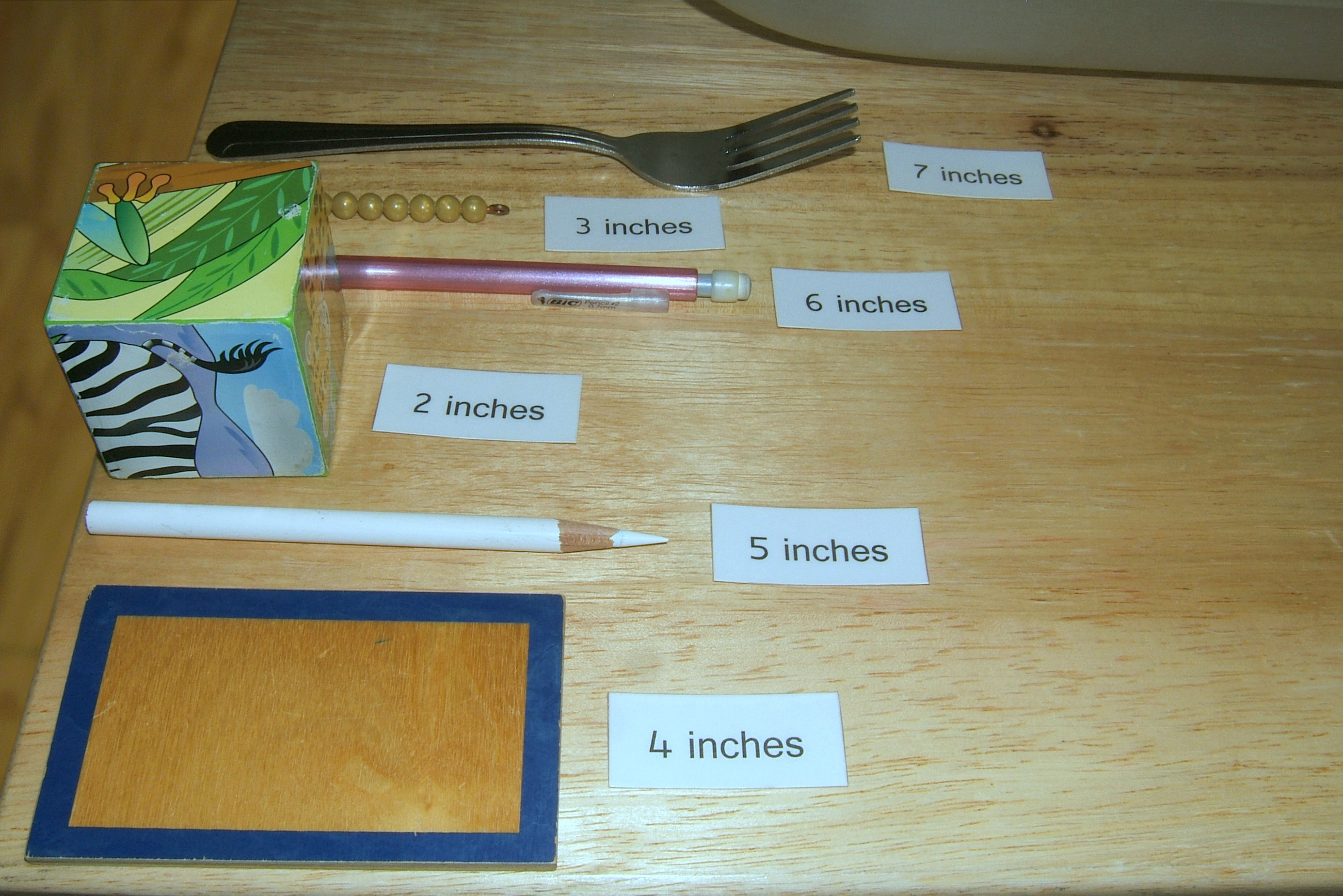 File:Measurement 2-7.jpg - Montessori Album