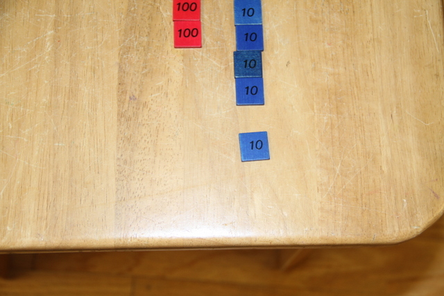 File:Stamp Game Dynamic Addition 10.JPG - Montessori Album