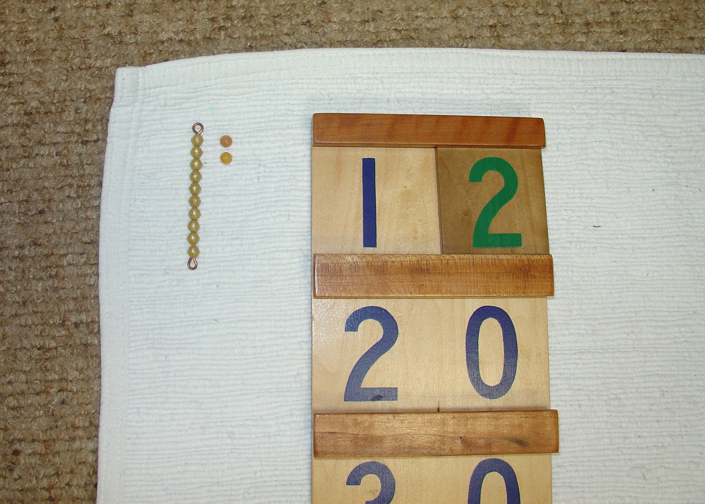File:Tens Board with Beads 9.JPG - Montessori Album