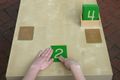 File:Sandpaper Numerals 4.JPG - Montessori Album